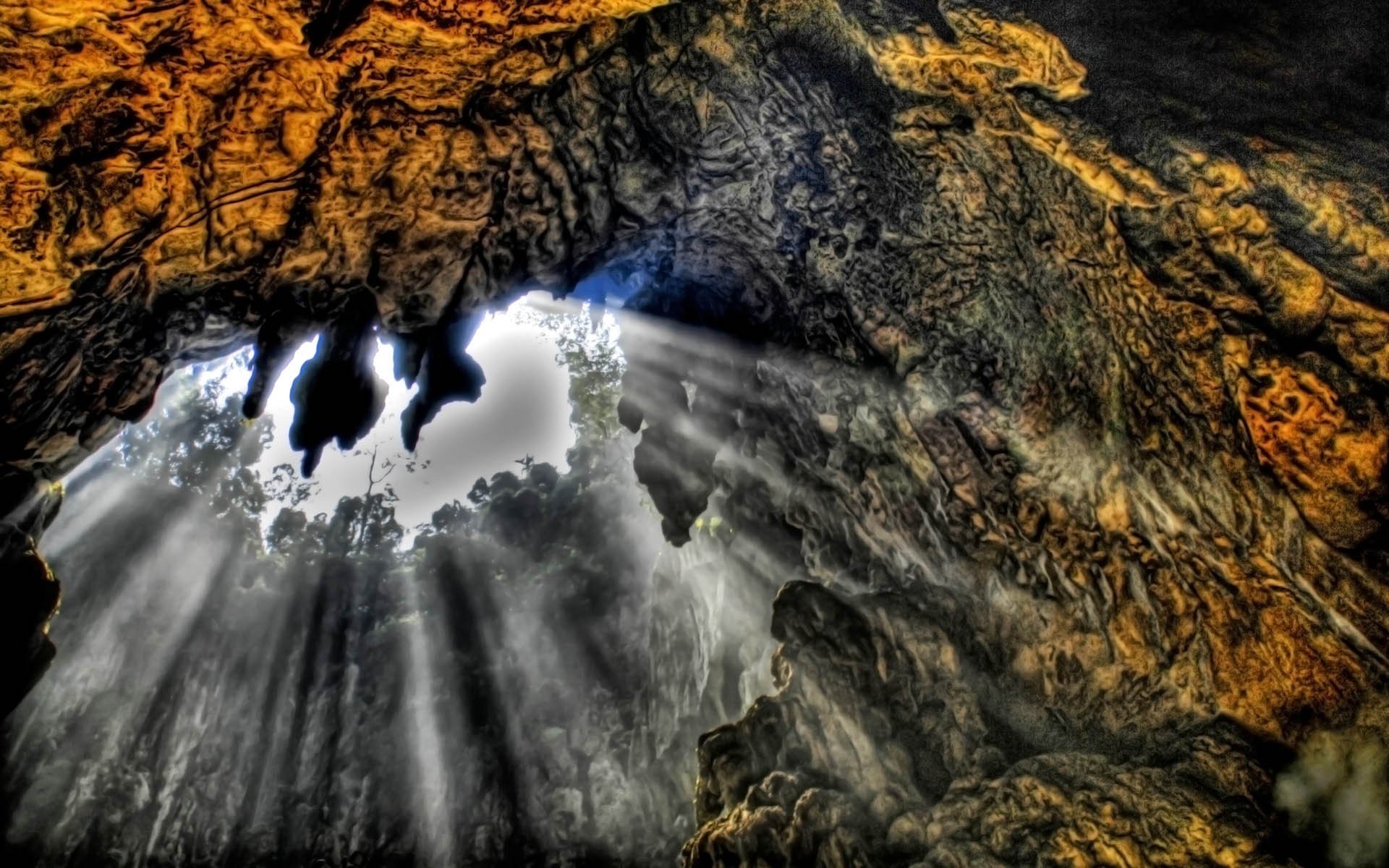 Sunlit Serenity: Nature’s Cave in Stunning HD