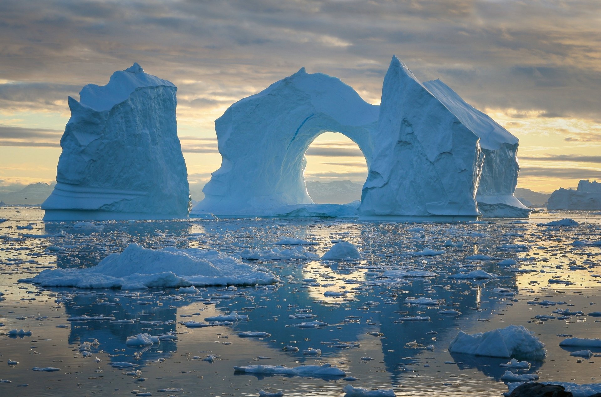 Arctic Arch Reflection: Stunning Iceberg Nature HD Wallpaper