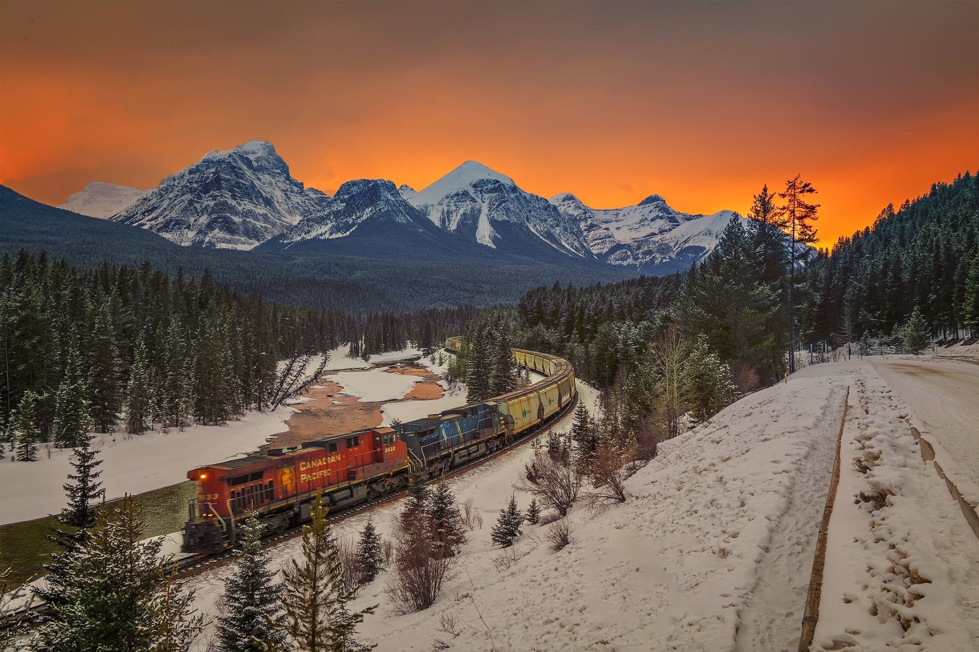 Majestic Canadian Mountain Train Ride Through Winter Forest | HD Wallpaper