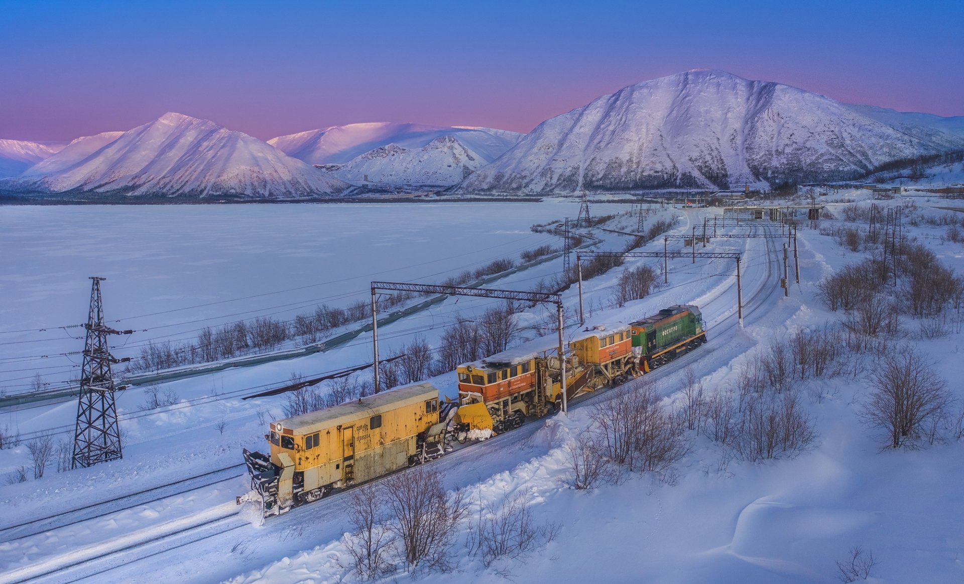 Winter Landscape: HD Wallpaper of a Scenic Snowy Train Journey