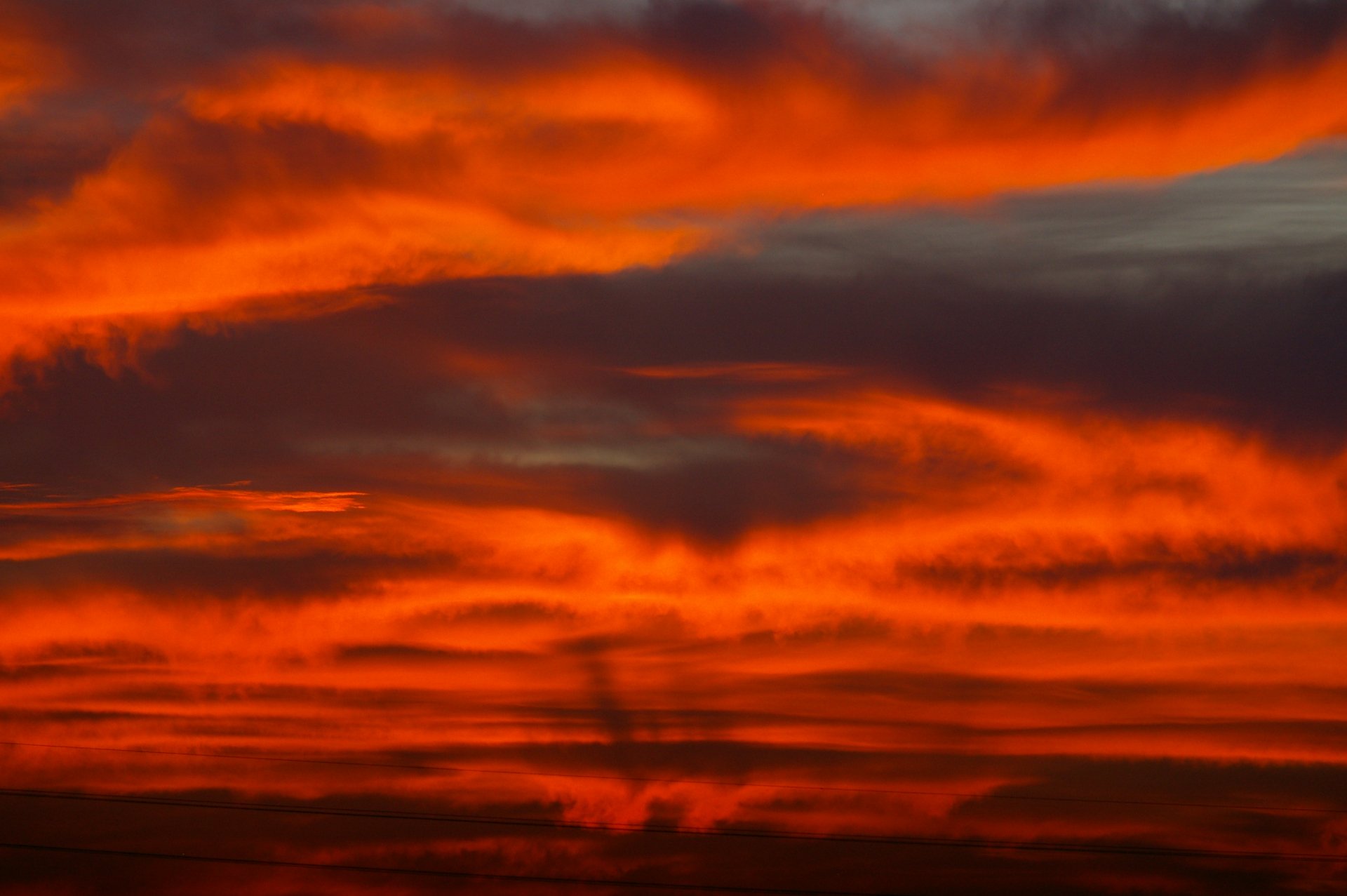 Fiery Red Skies: Nature's Stunning HD Wallpaper