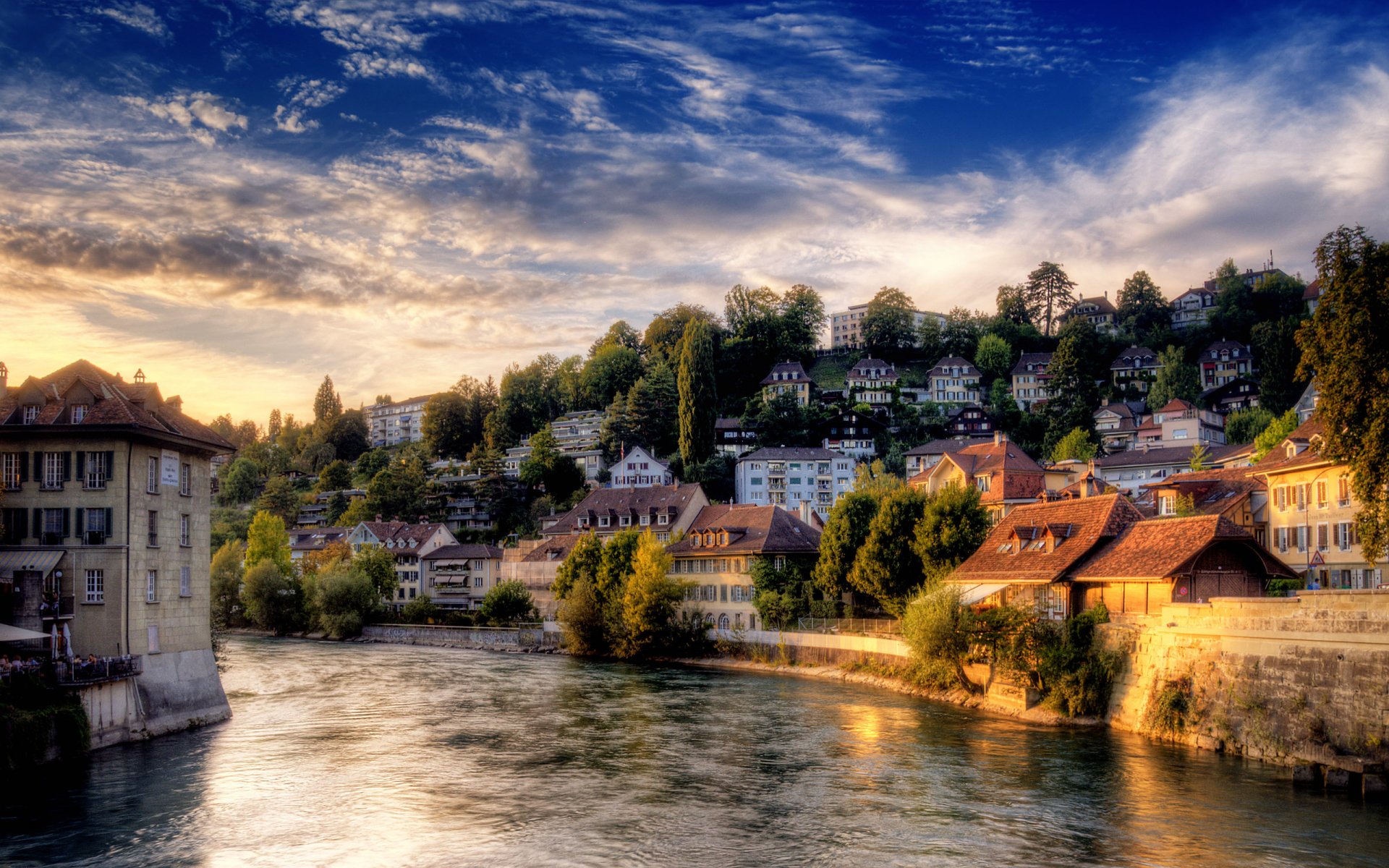 Stunning HD Landscape Photography: Serene Riverside Village at Sunset