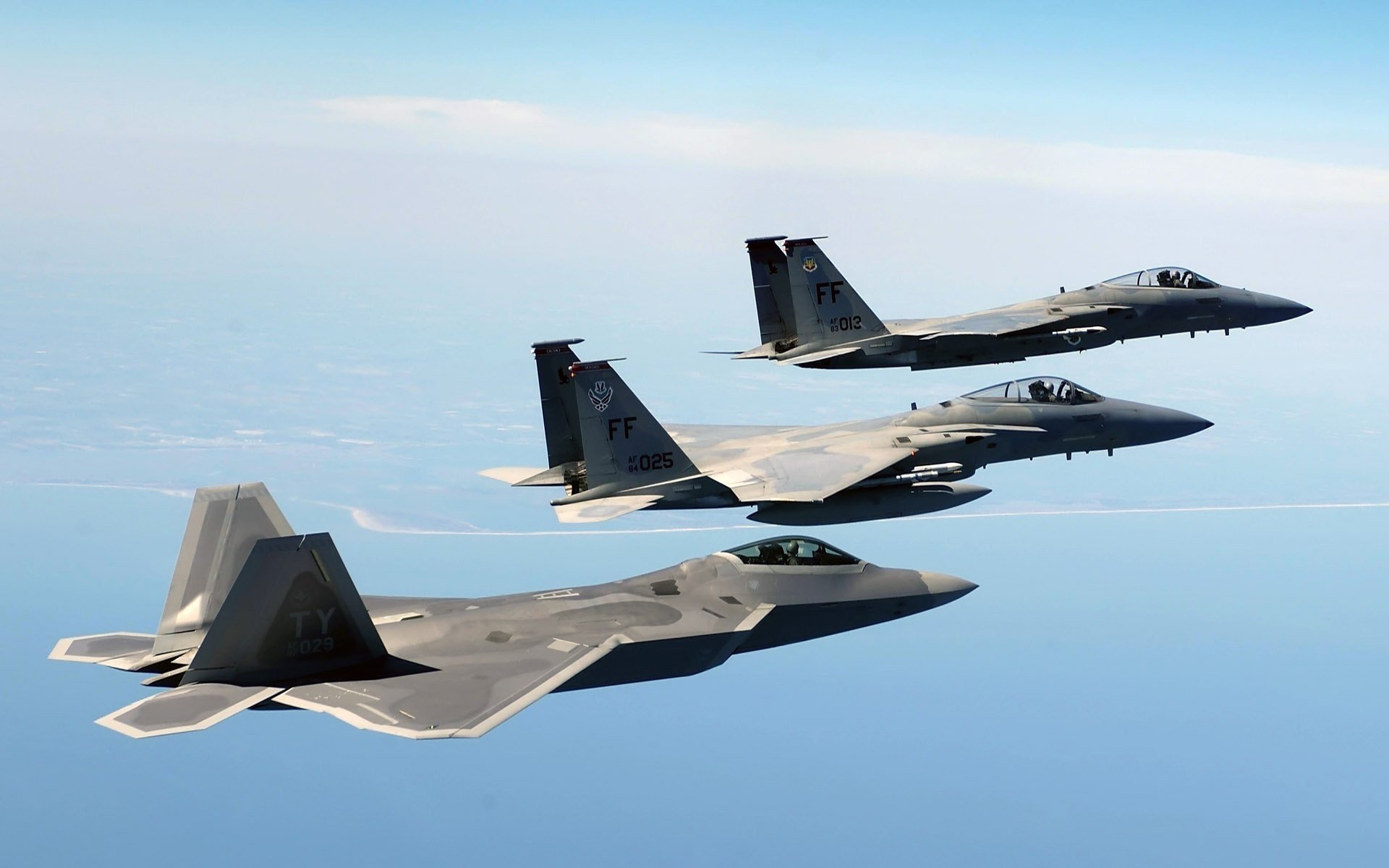 Elite Skies: F-22 Raptor & F-15 Eagle Military Jet Fighters in HD