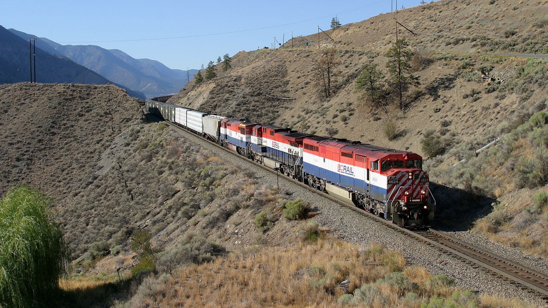 HD Scenic Train Journey Through Rugged Mountain Terrain