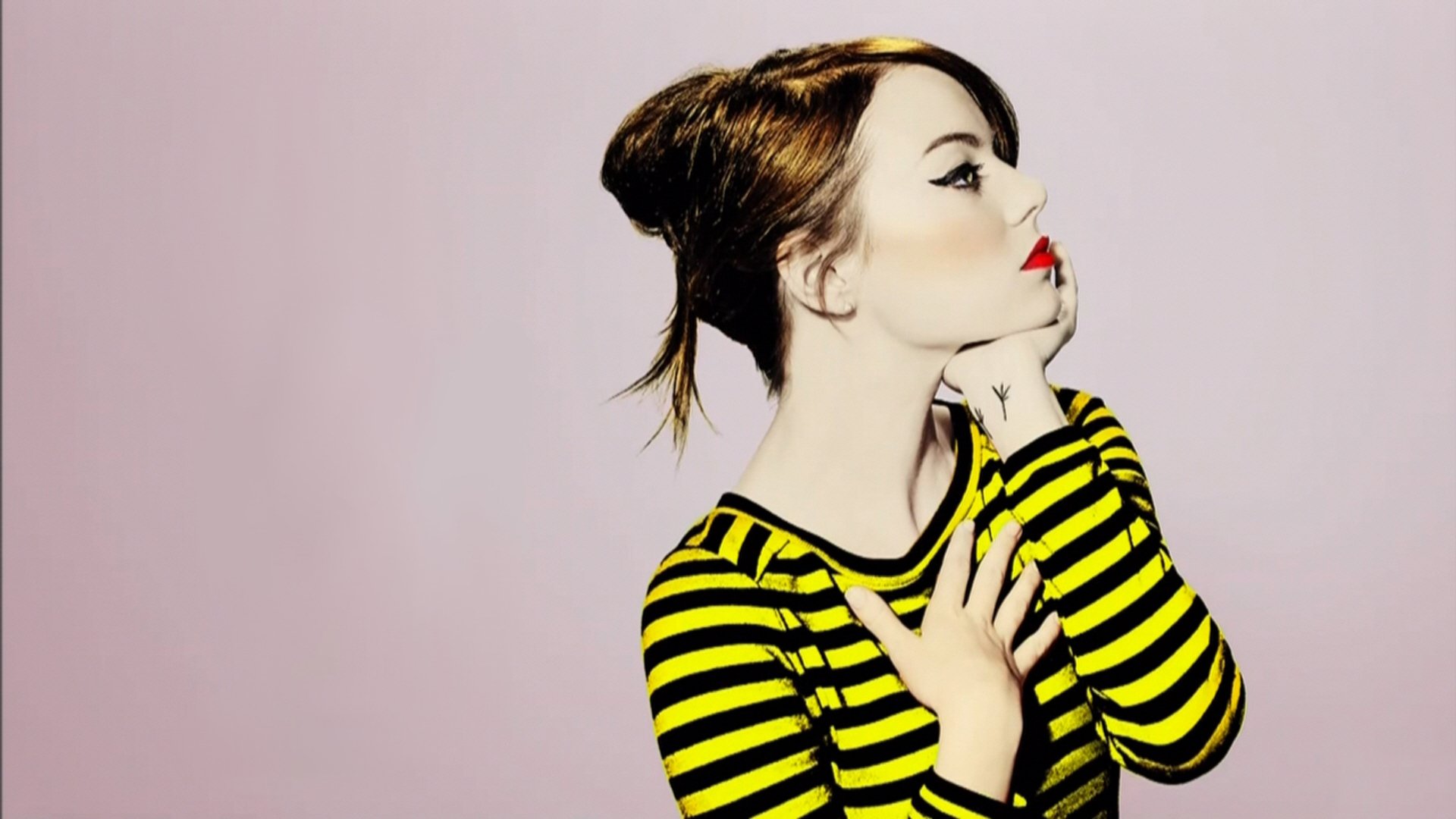 Emma Stone HD Wallpaper: Striking Portrait in Bold Stripes