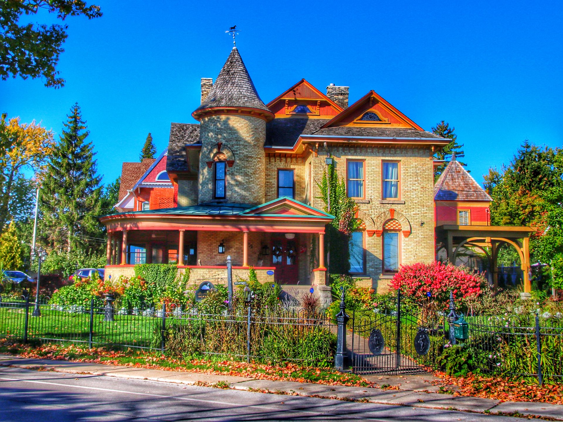 Canada’s Colorful Castle: Vibrant HD Home Behind Charming Fence ...