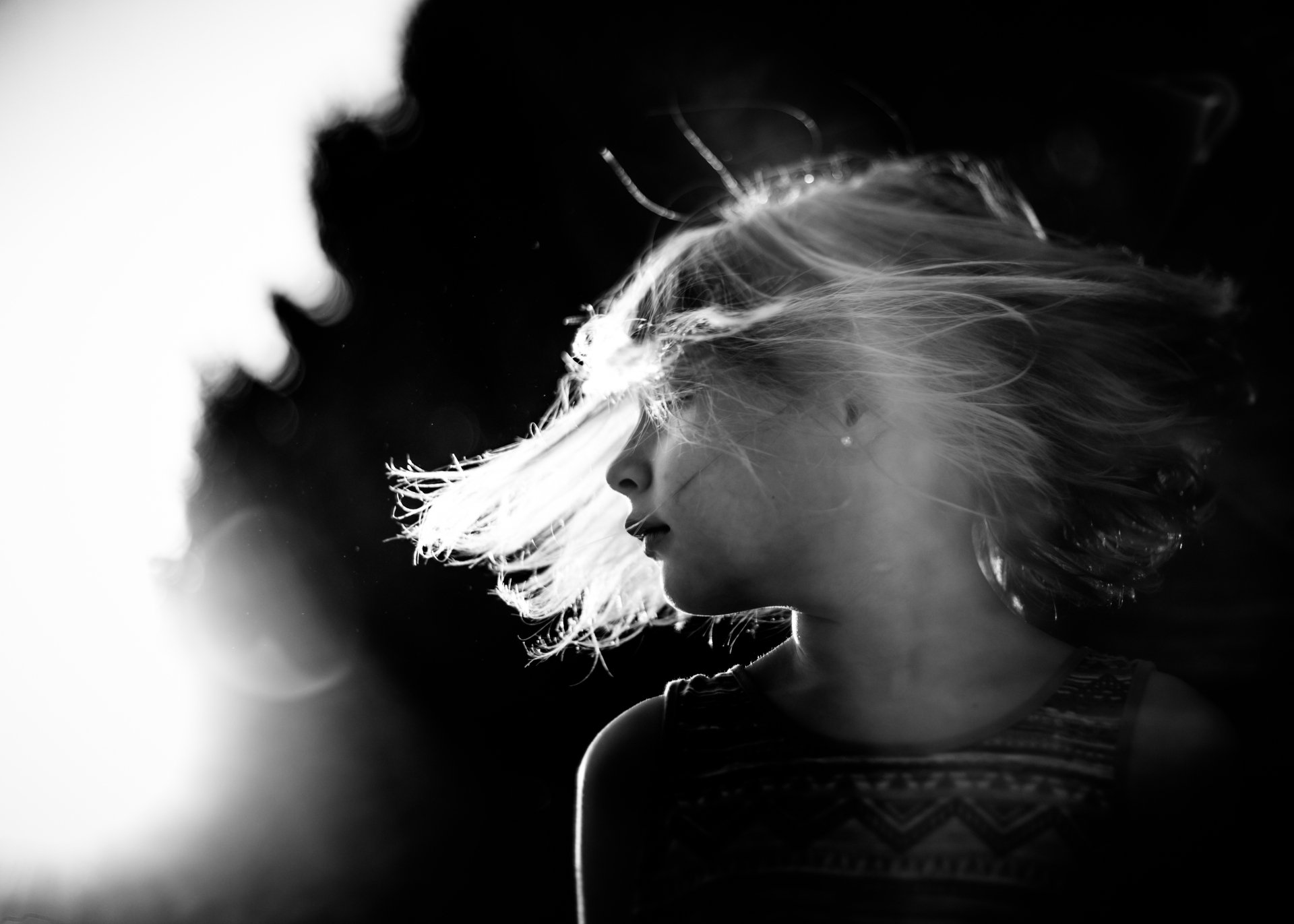 Sunlit Silhouette: Black & White 4K Ultra HD Woman’s Face