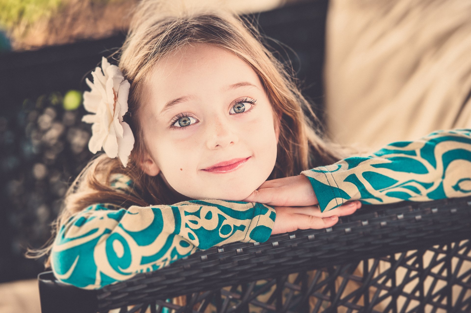 Radiant Blonde Girl with Sparkling Blue Eyes – HD Child Portrait