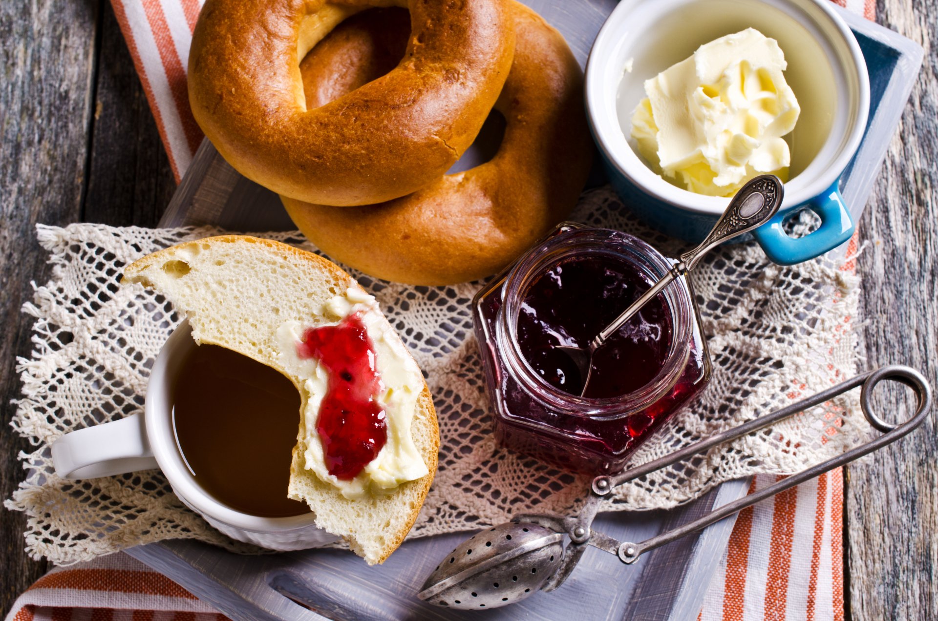 Delicious 4K Breakfast: Bagels with Cream, Jam, and Fresh Bread Delight