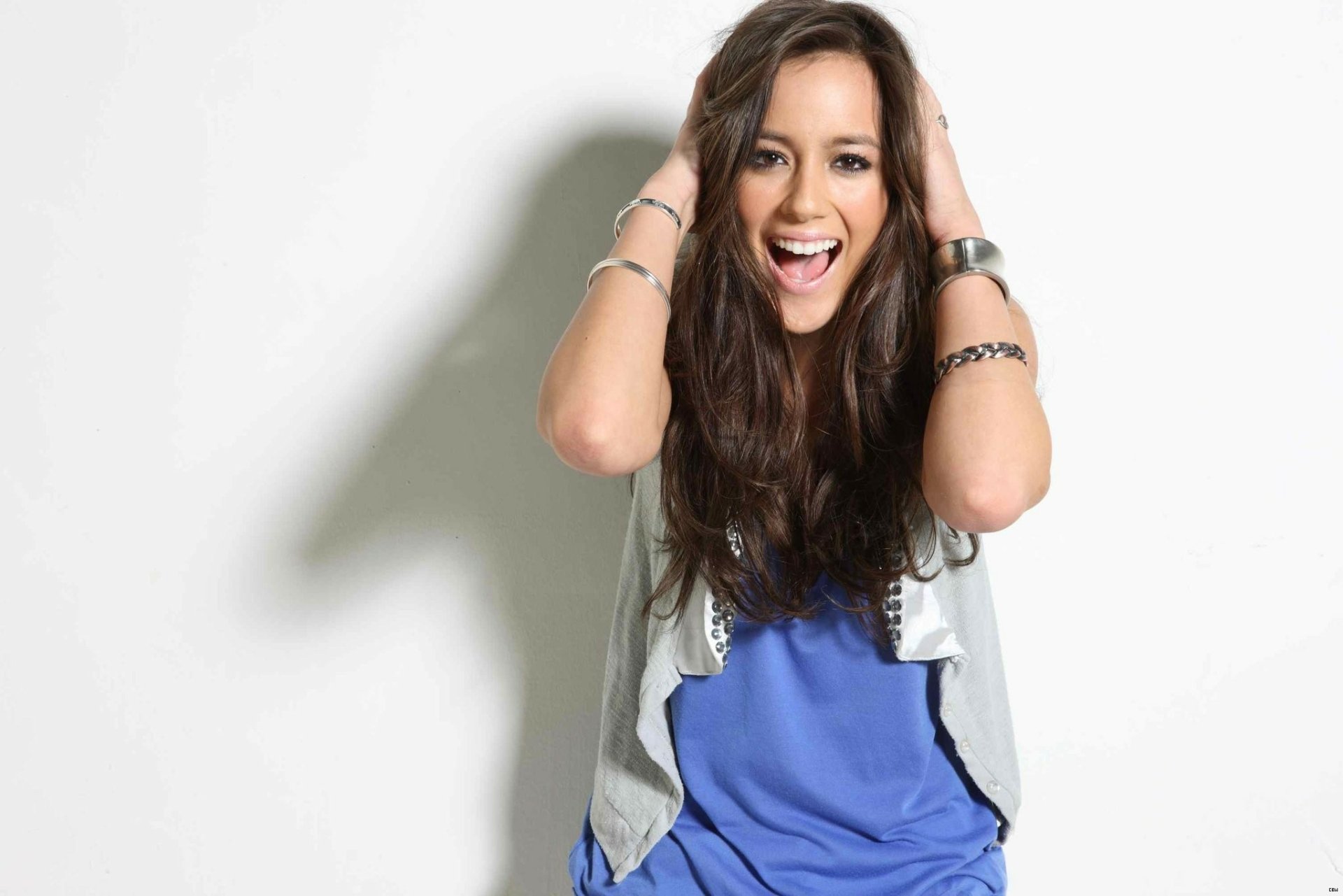 Chloe Bennet Radiates Joy: Stunning Brown-Eyed Celebrity Smile HD Wallpaper