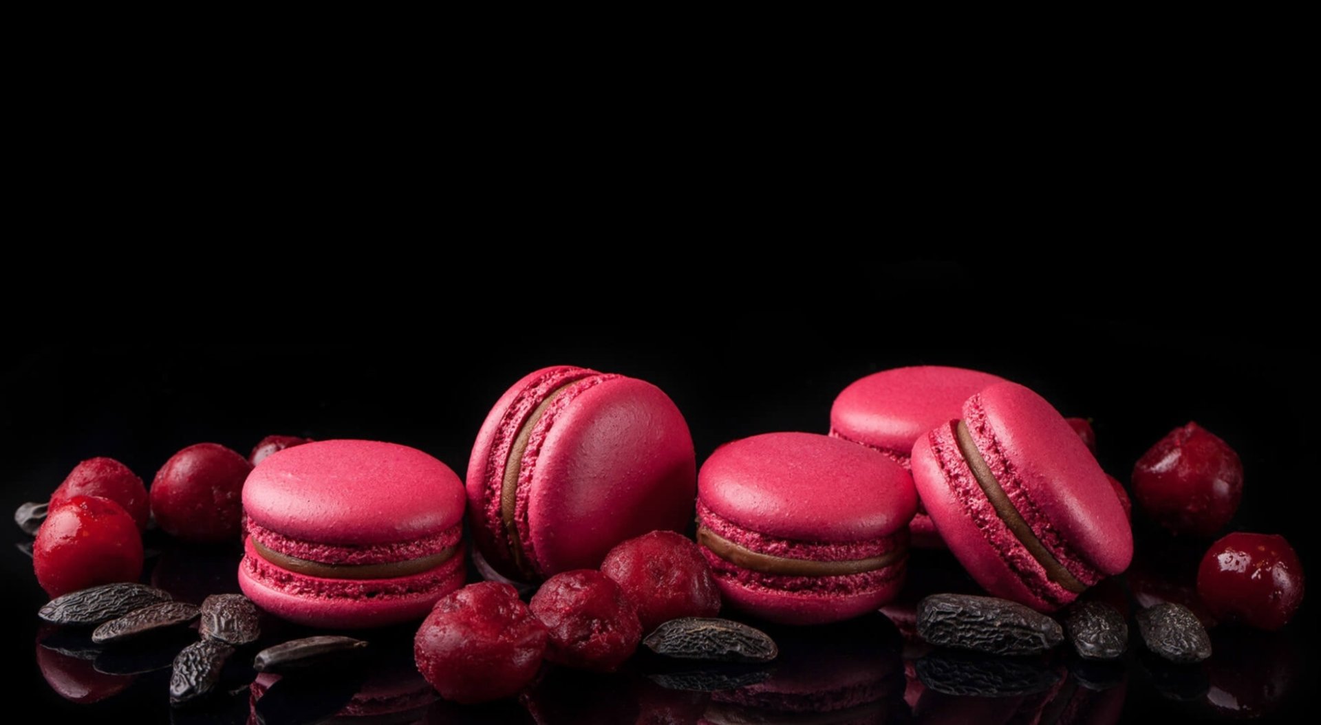 Delicious Red Macarons HD Wallpaper – Sweet Elegance in Every Bite