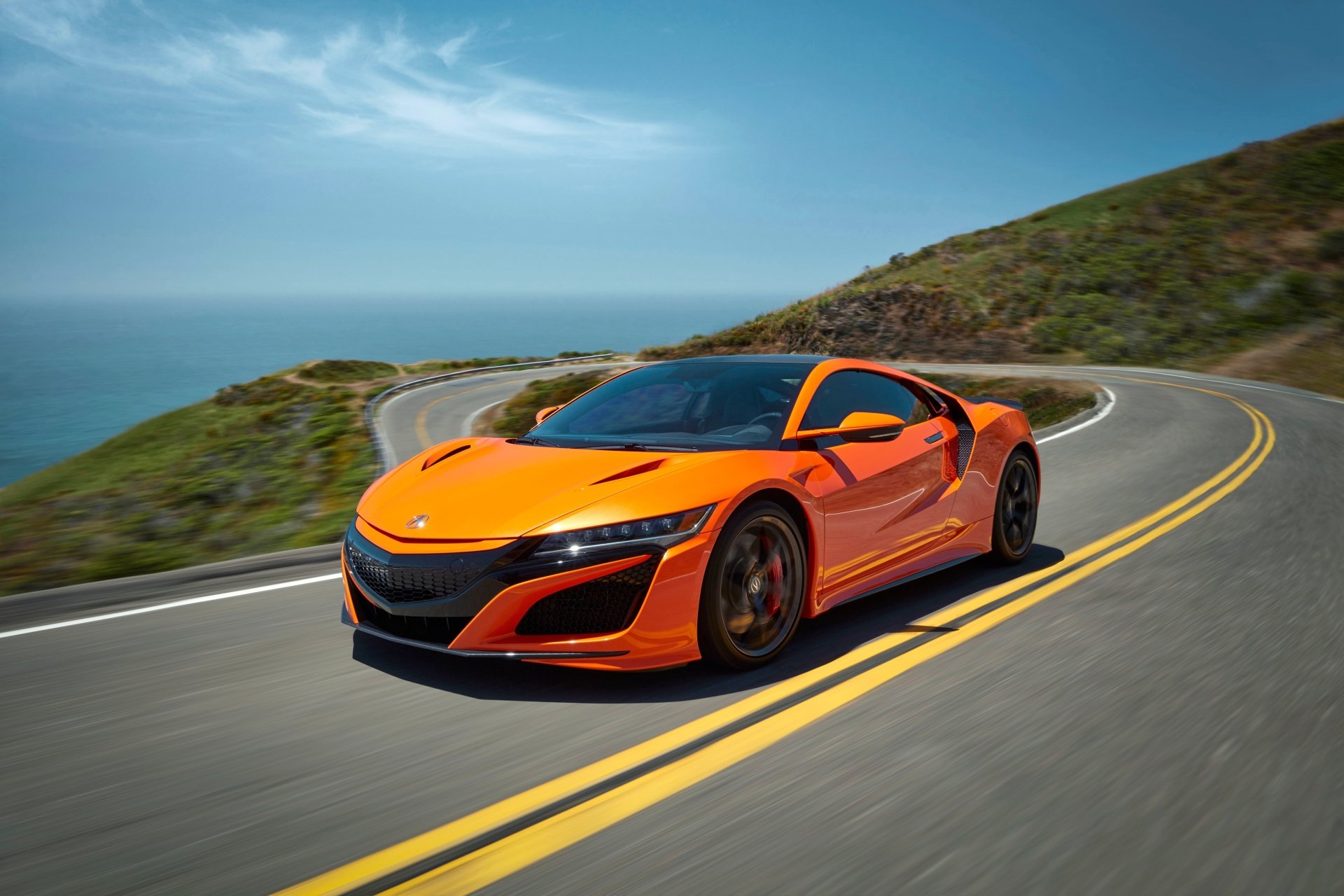 4K Ultra HD Orange Acura NSX Supercar on Scenic Coastal Road