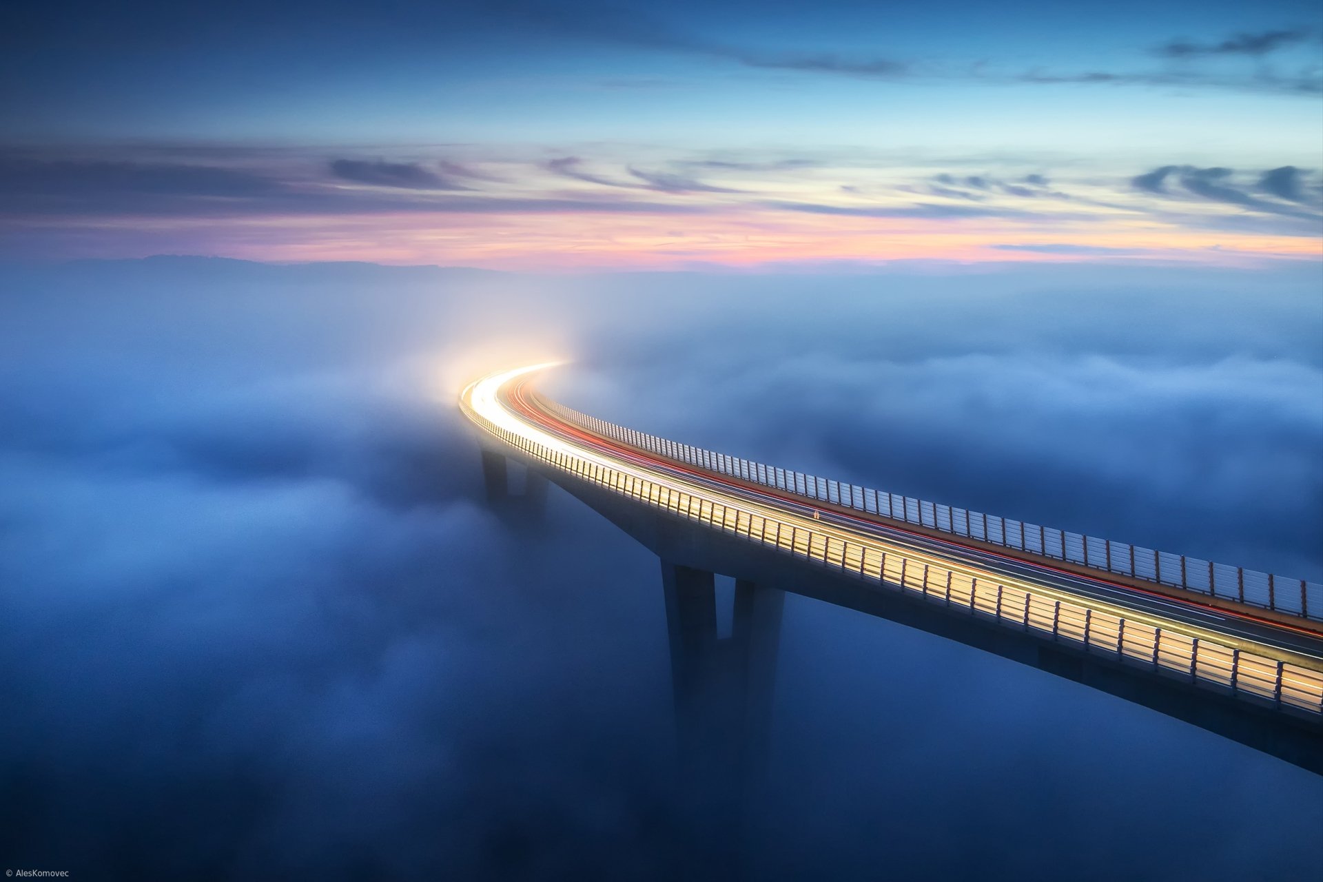 Ethereal Time-Lapse: Illuminated Bridge Piercing the Foggy Horizon | HD ...